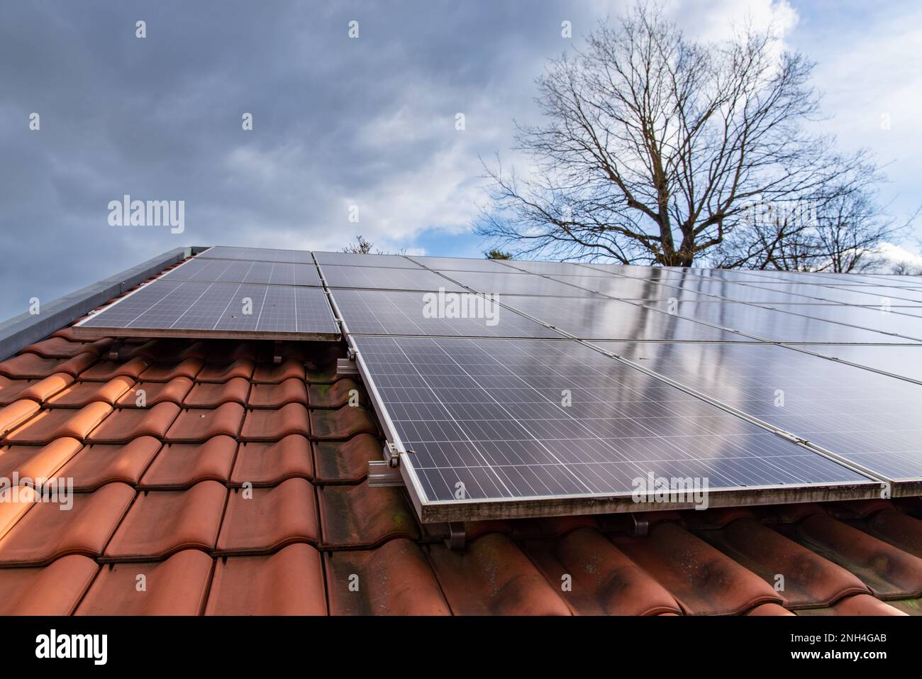 Photovoltaic modules in front of blue and cloudy autumn sky Stock Photo ...