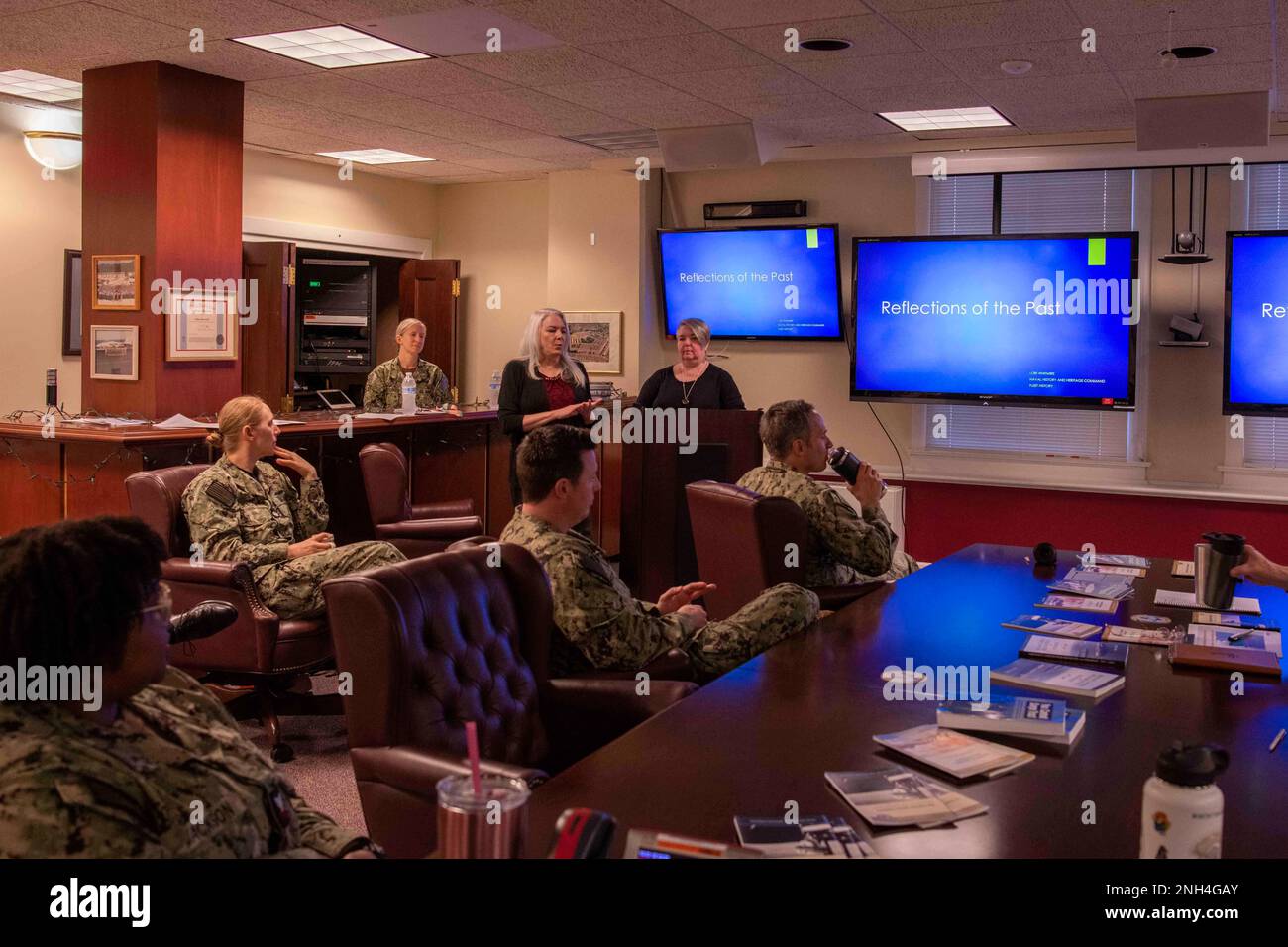 Dr. Anna Holloway, a Naval History and Heritage Command historian, gives a presentation to ...