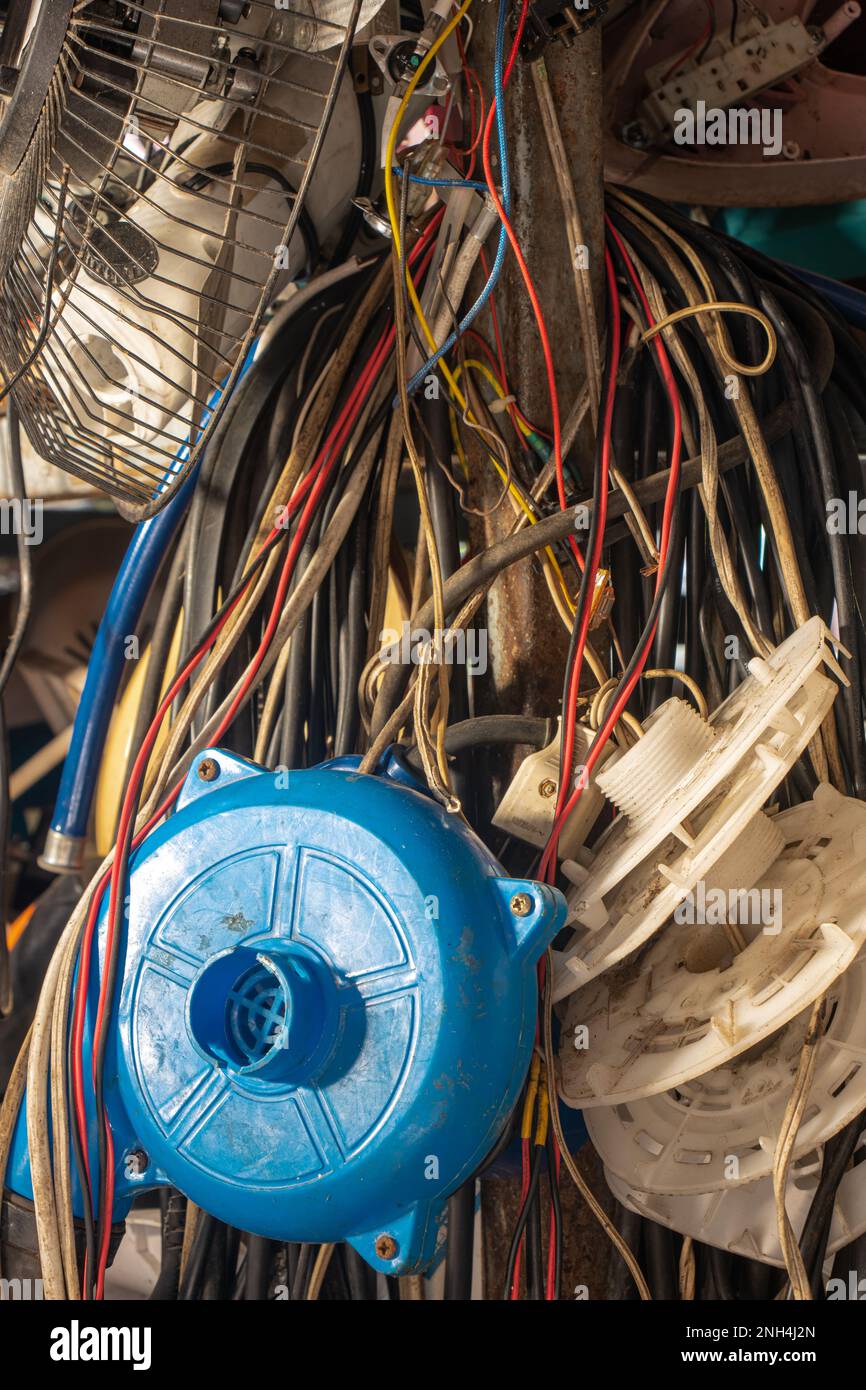 A lot of material and parts for repairing a fan in an workshop Stock ...