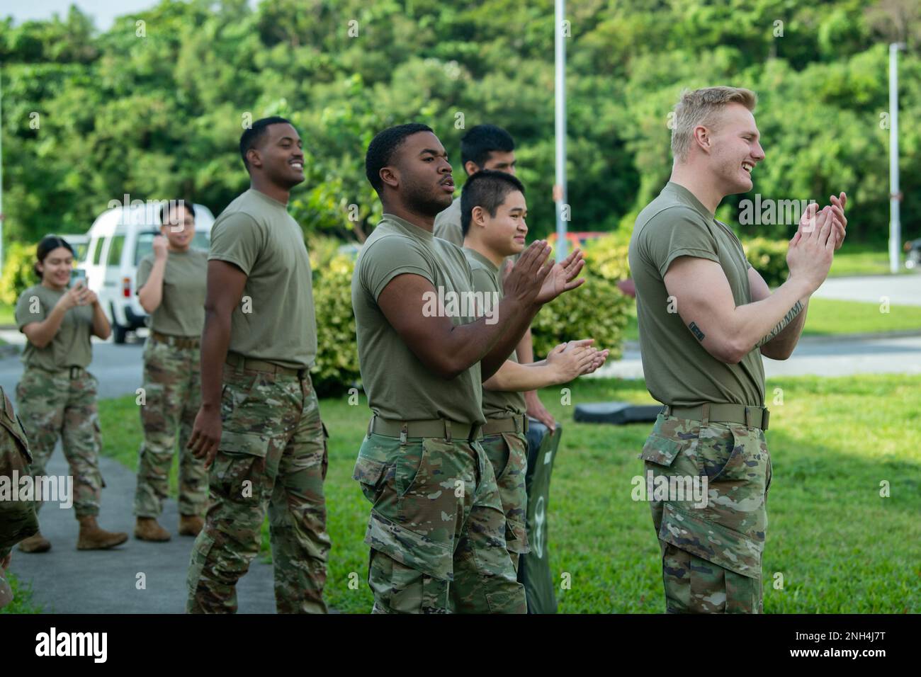 Defenders assigned to the 18th Security Forces Squadron cheer on their ...