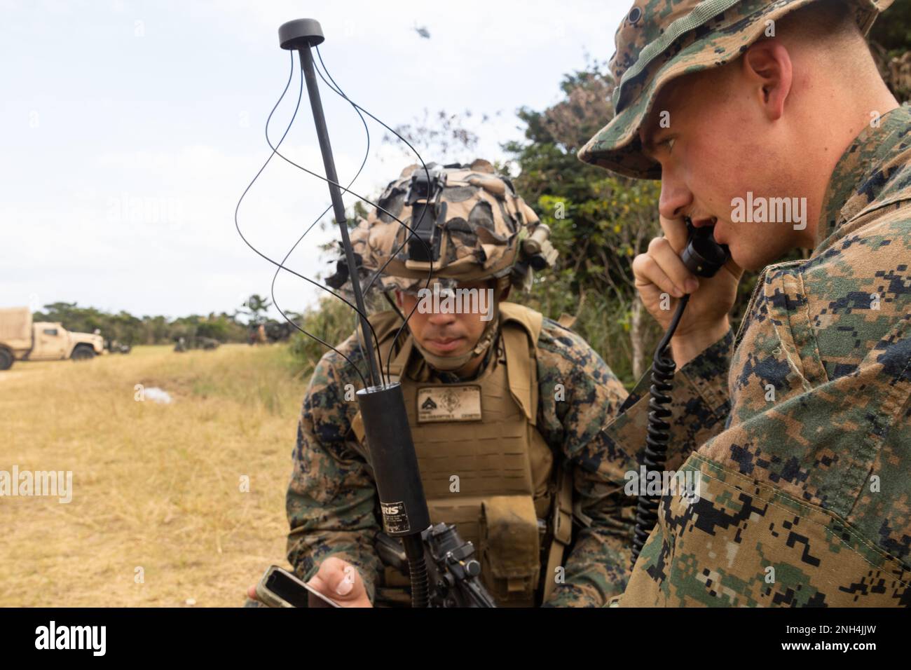 U.S. Marine Corps Cpl. Keanu Delossantos, left, and Pfc. Logan Reich ...