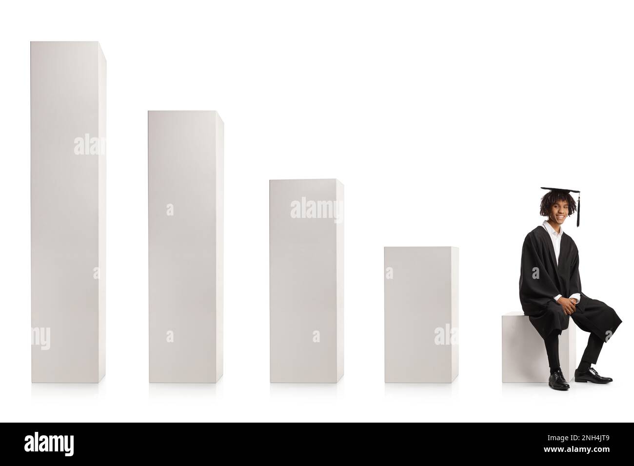 Male african american graduate student in a gown sitting on a bar chart ...