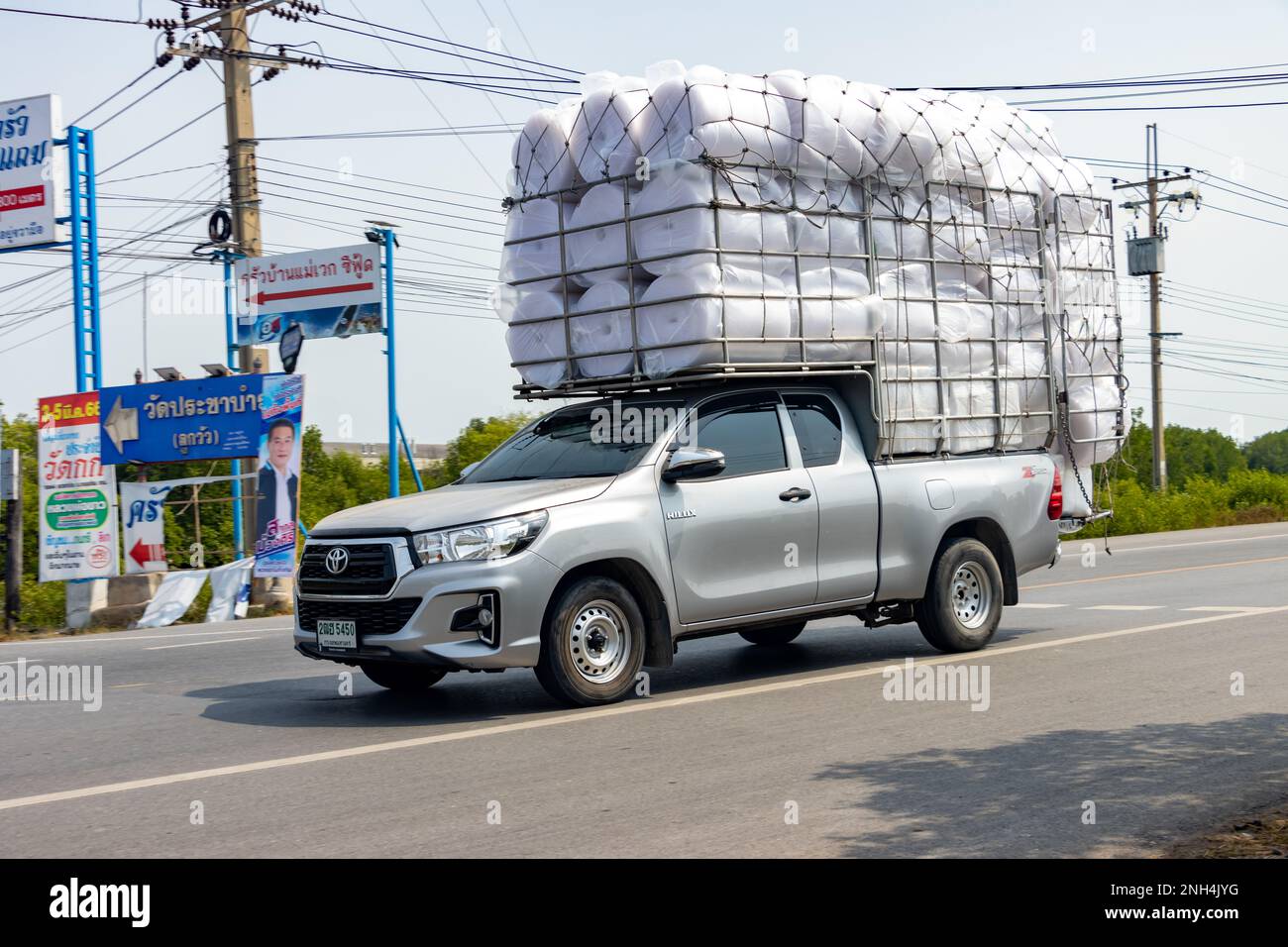 BANGKOK, THAILAND, FEB 07 2023, A pick up car loaded with many sacks of ...