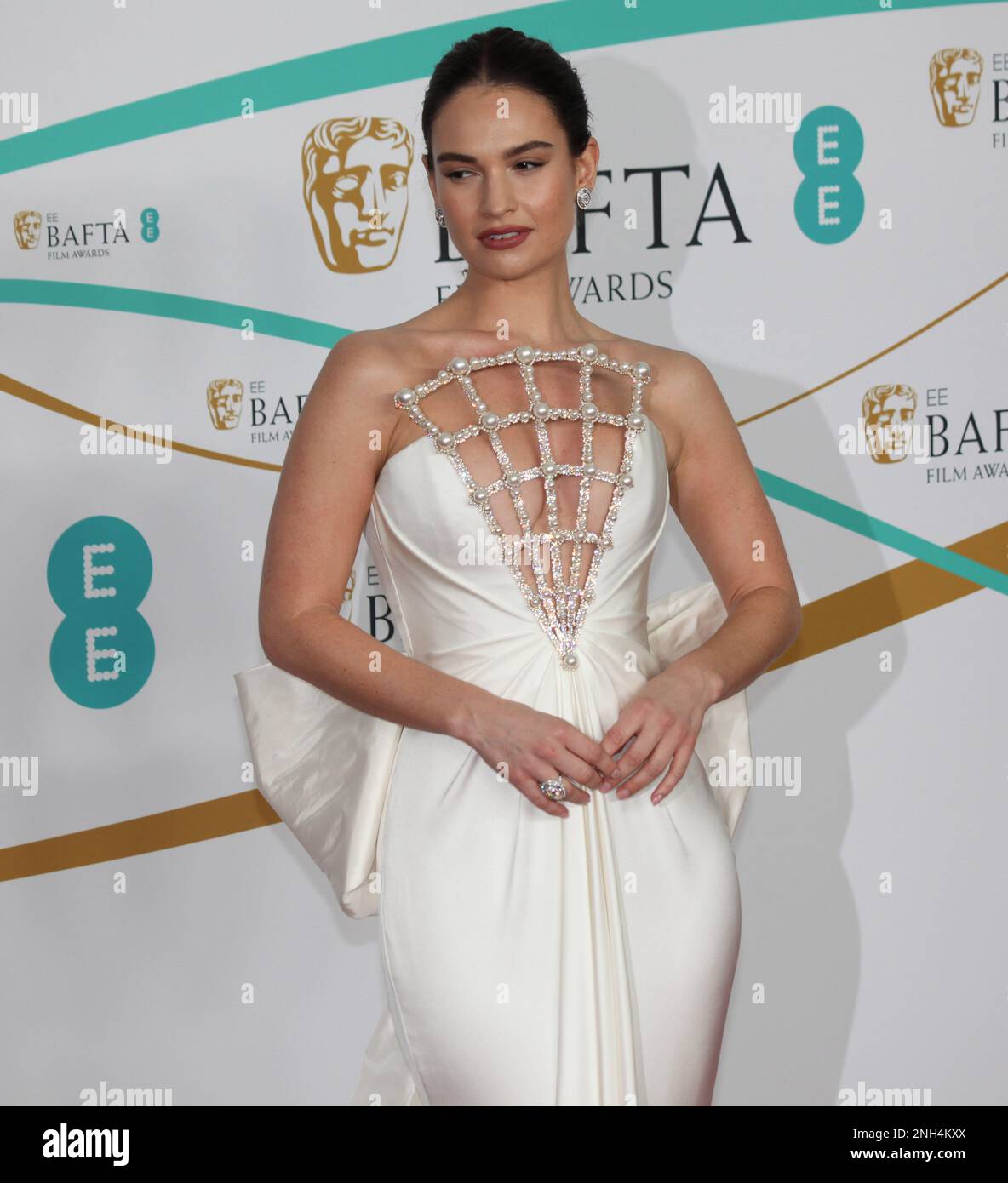 London, UK. Lily James at the EE BAFTA Film Awards 2023 at The Royal Festival Hall on February ...