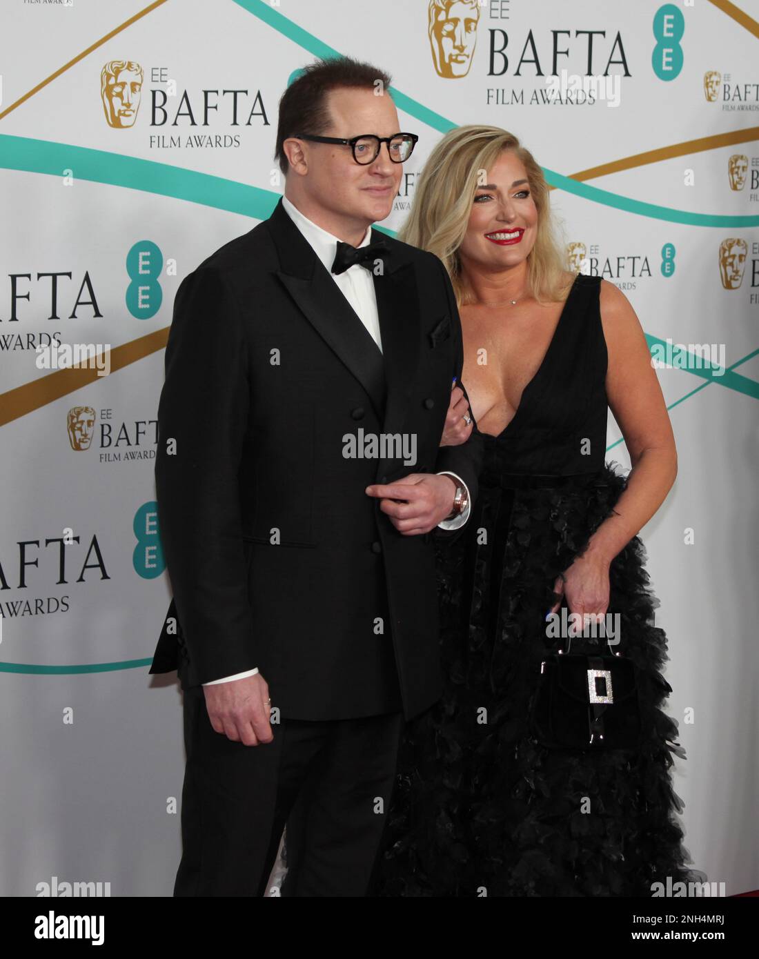 London, UK. Brendan Fraser and Jeanne Moore at the EE BAFTA Film Awards 2023 at The Royal ...