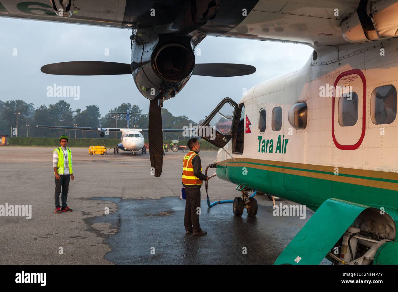 KATHMANDU/NEPAL - OCTOBER 18, 2015: Tara Air small plane getting ready ...
