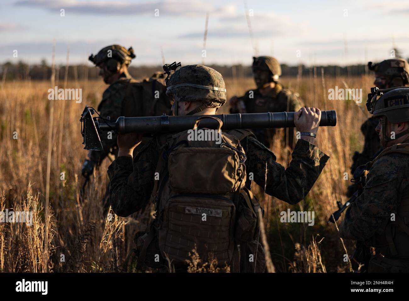 A U.S. Marine with Charlie Company, Battalion Landing Team (BLT) 1/6 ...