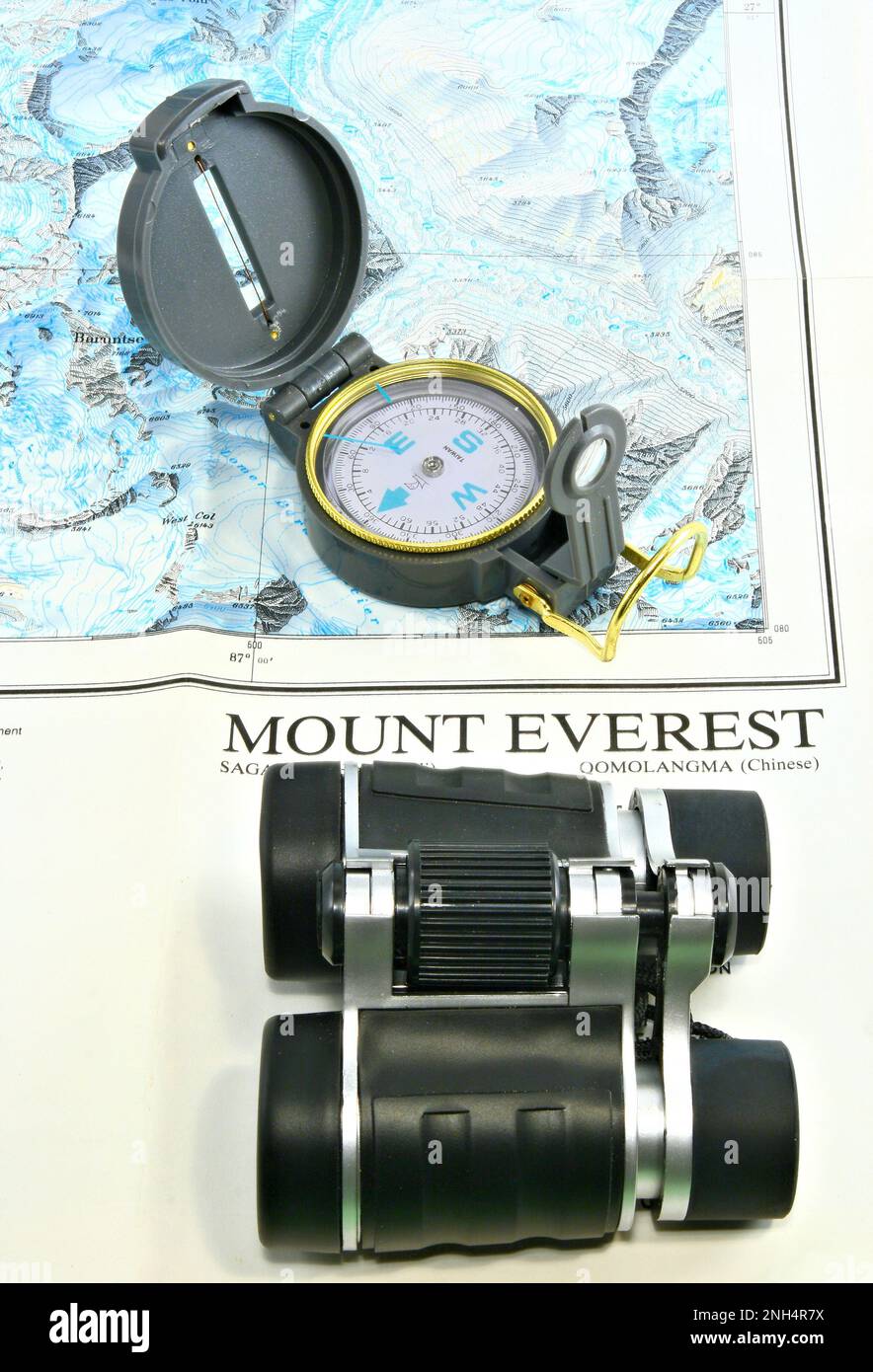 binocular and compass on everest map Stock Photo - Alamy