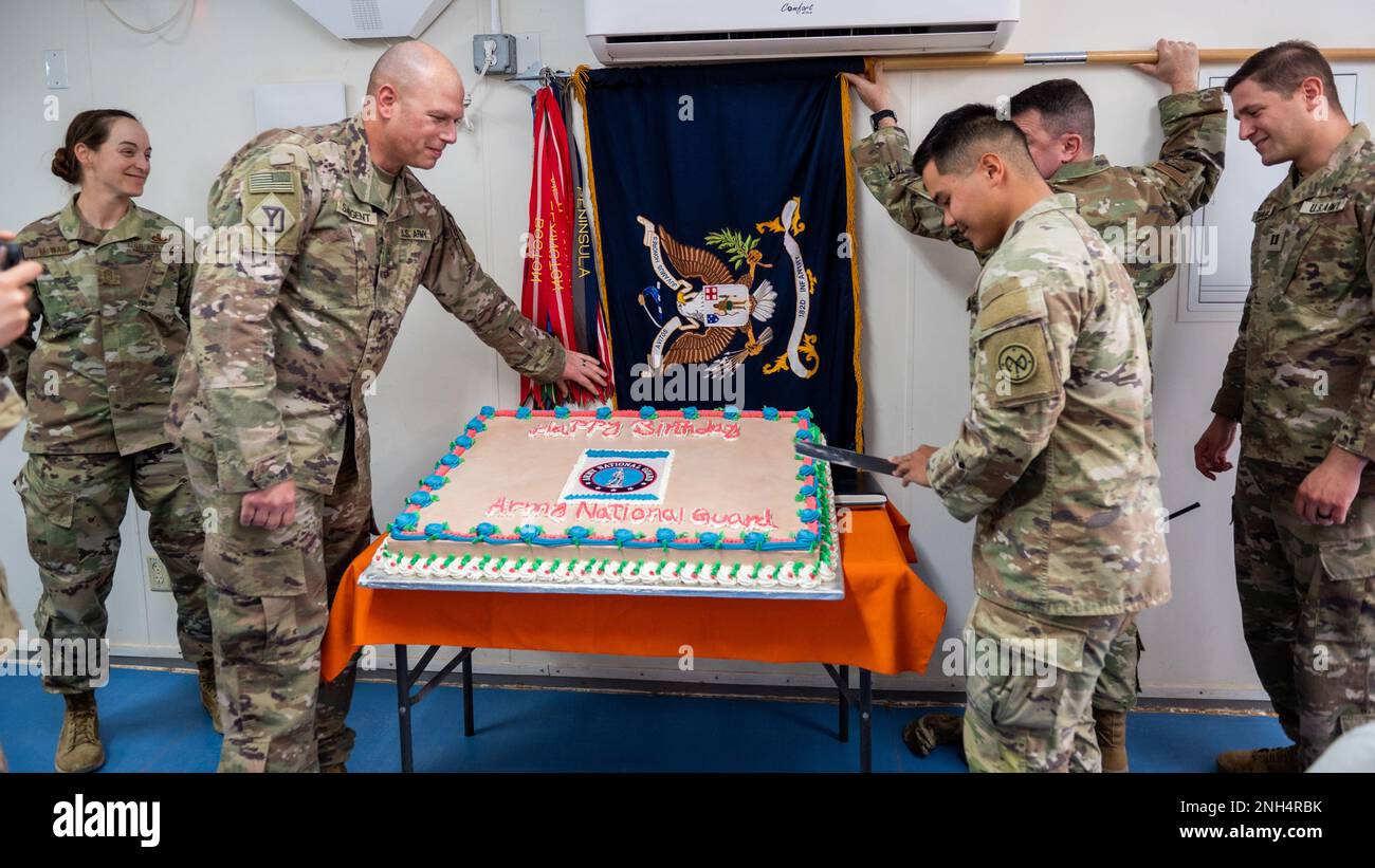 U.S. Army Spc. Joseph Doroski, with the 1-182nd Infantry Regiment cuts ...