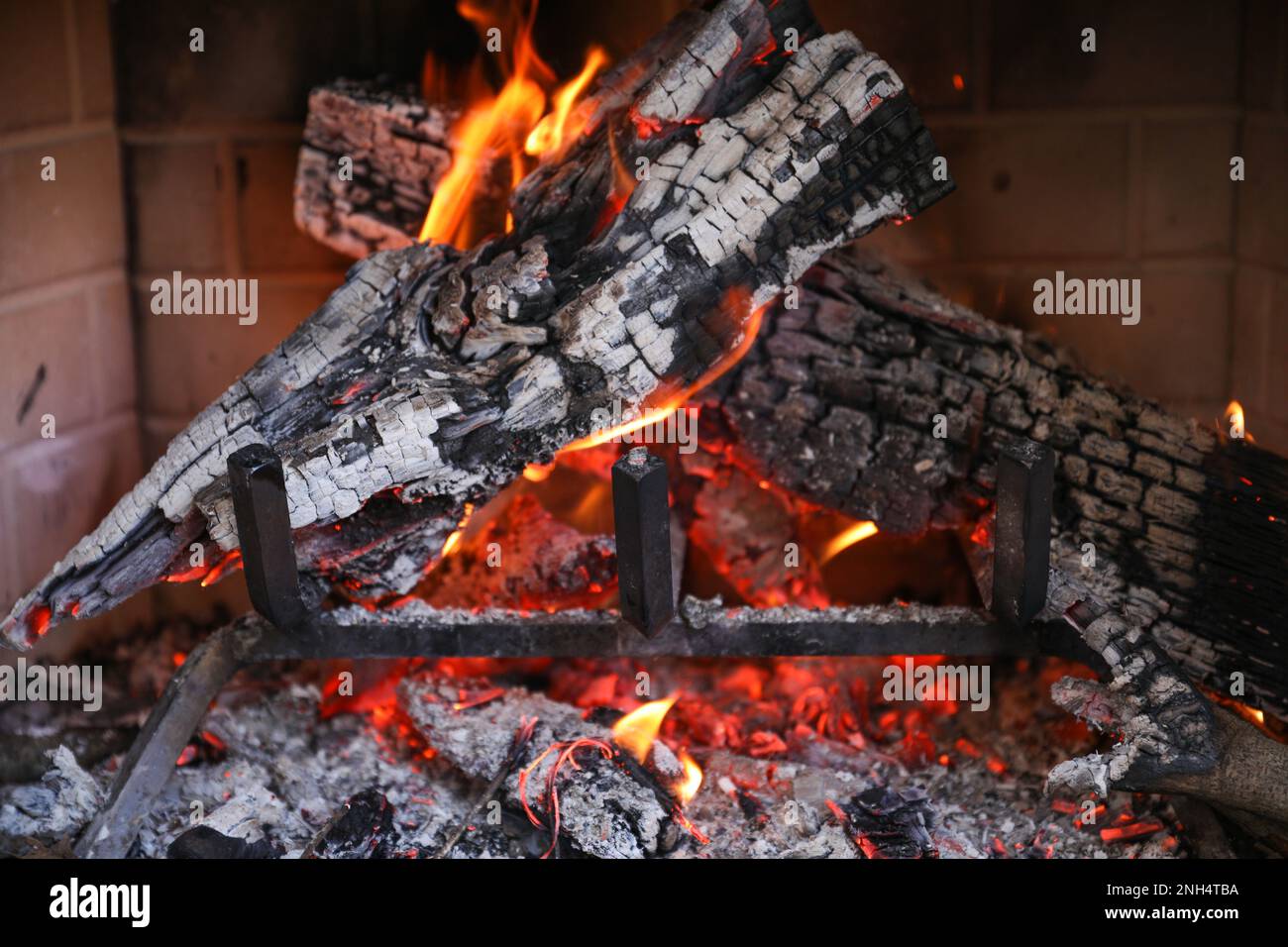 wood burning fire and smoke around bonfire fireplace with flames Stock ...