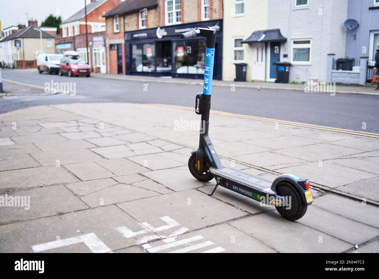Electric Scooter outside a parking bay Stock Photo - Alamy