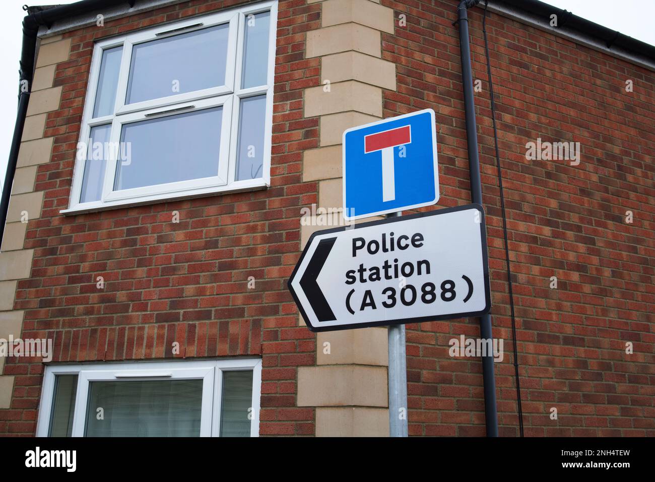 police station sign in city centre Stock Photo - Alamy