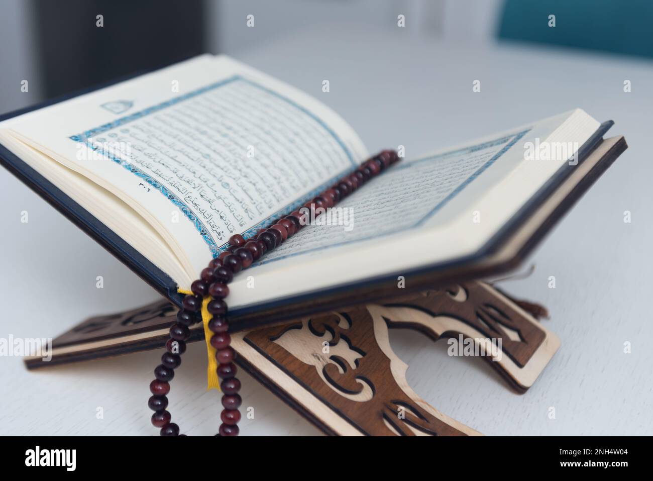 The words on Qoran is arabic words which means the Holy Qoran. Muslim ...