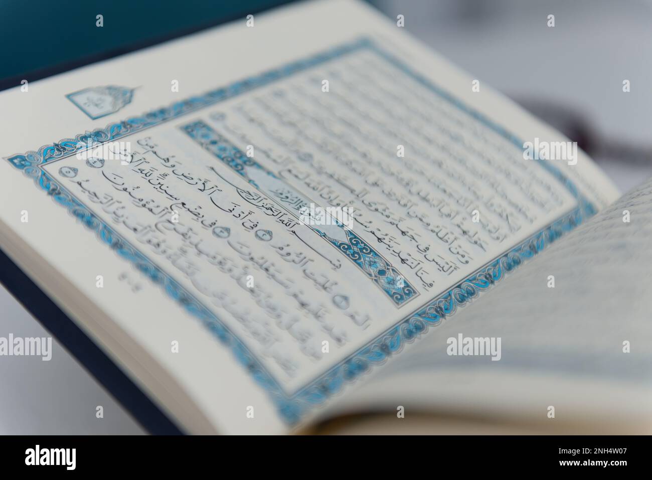 The words on Qoran is arabic words which means the Holy Qoran. Muslim ...