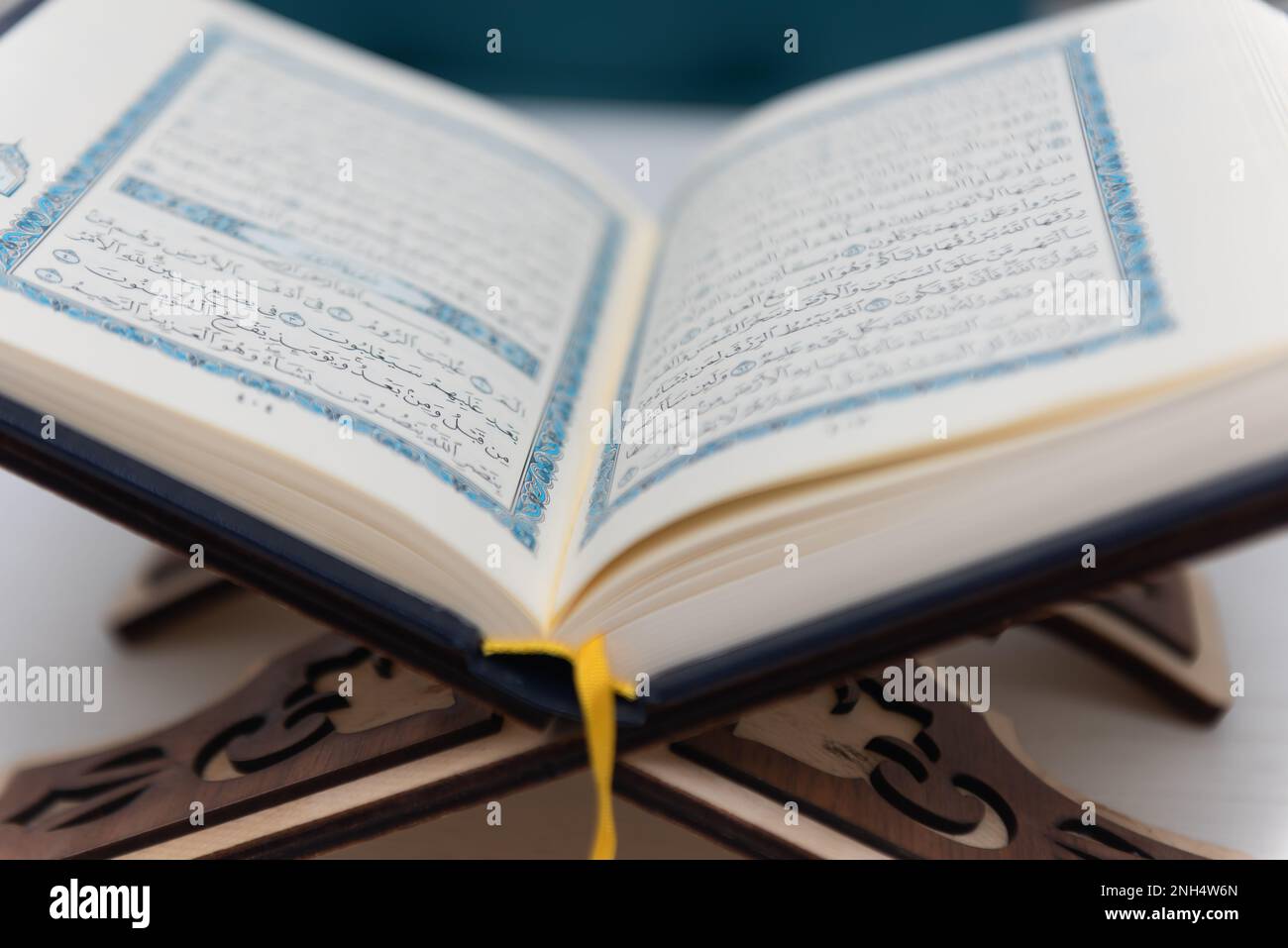 The words on Qoran is arabic words which means the Holy Qoran. Muslim ...