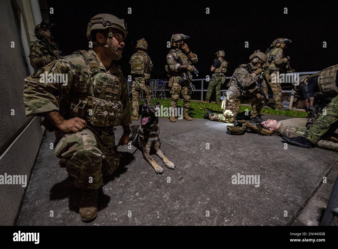 U.S. Air Force Staff Sgt. Kevin Santos, left, 18th Security Forces ...