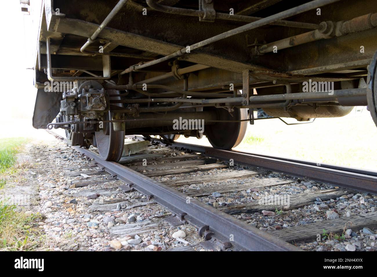 view from under rail car on railroad tracks Stock Photo - Alamy