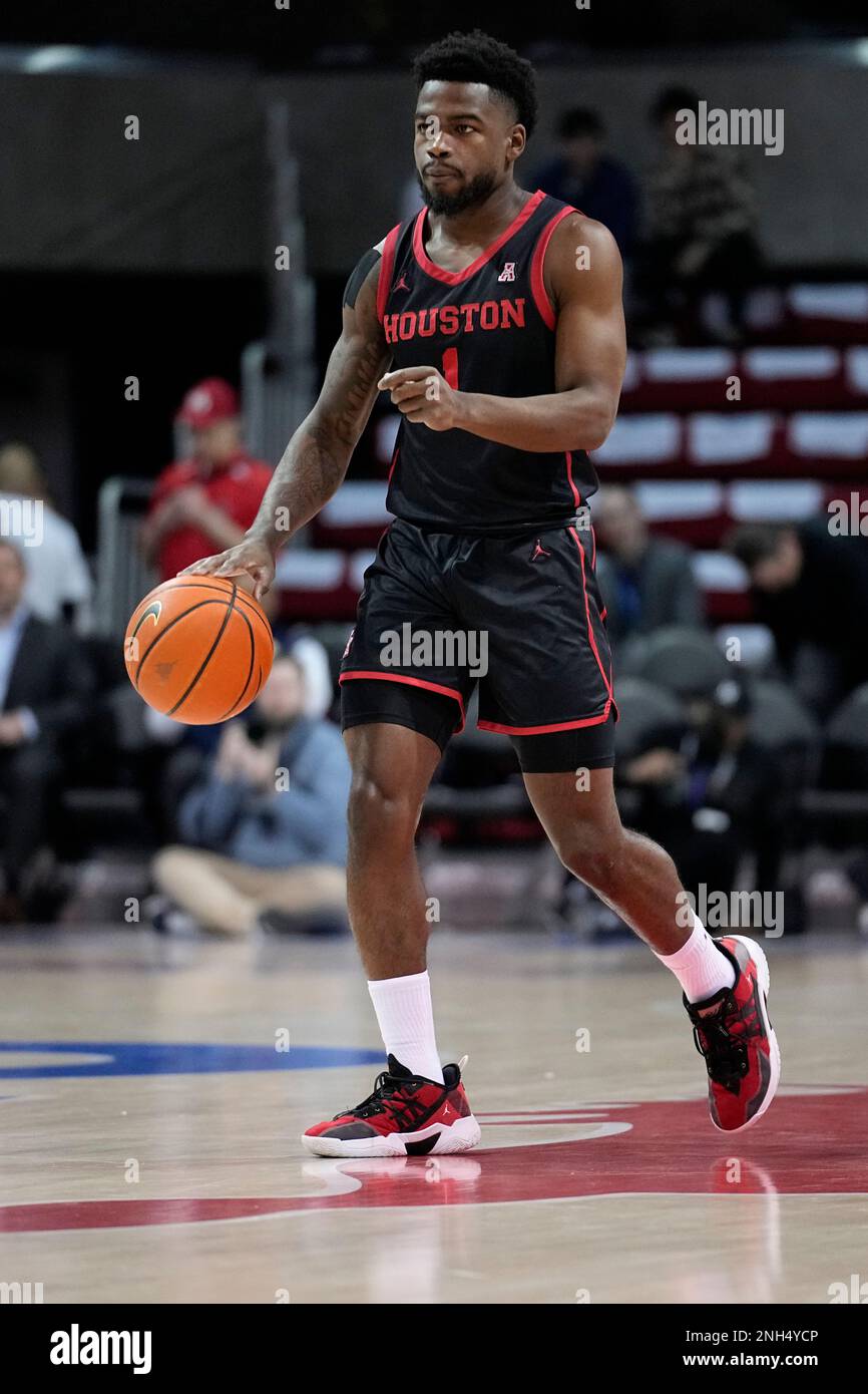 Houston guard Jamal Shead advances the ball against SMU during an NCAA ...