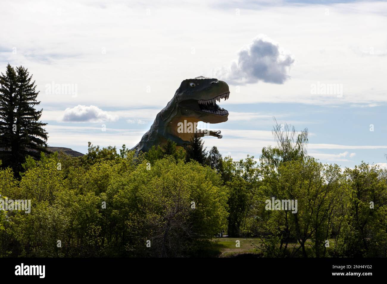 dinosaur towering above tree line Stock Photo - Alamy