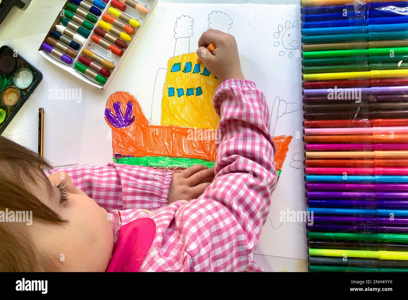 Young girl painting during art class at school Stock Photo - Alamy