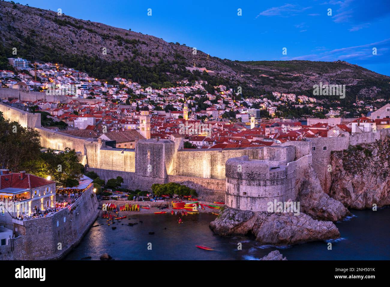 View of the old walled town of Dubrovnik at dusk from Fort Lovrijenac ...
