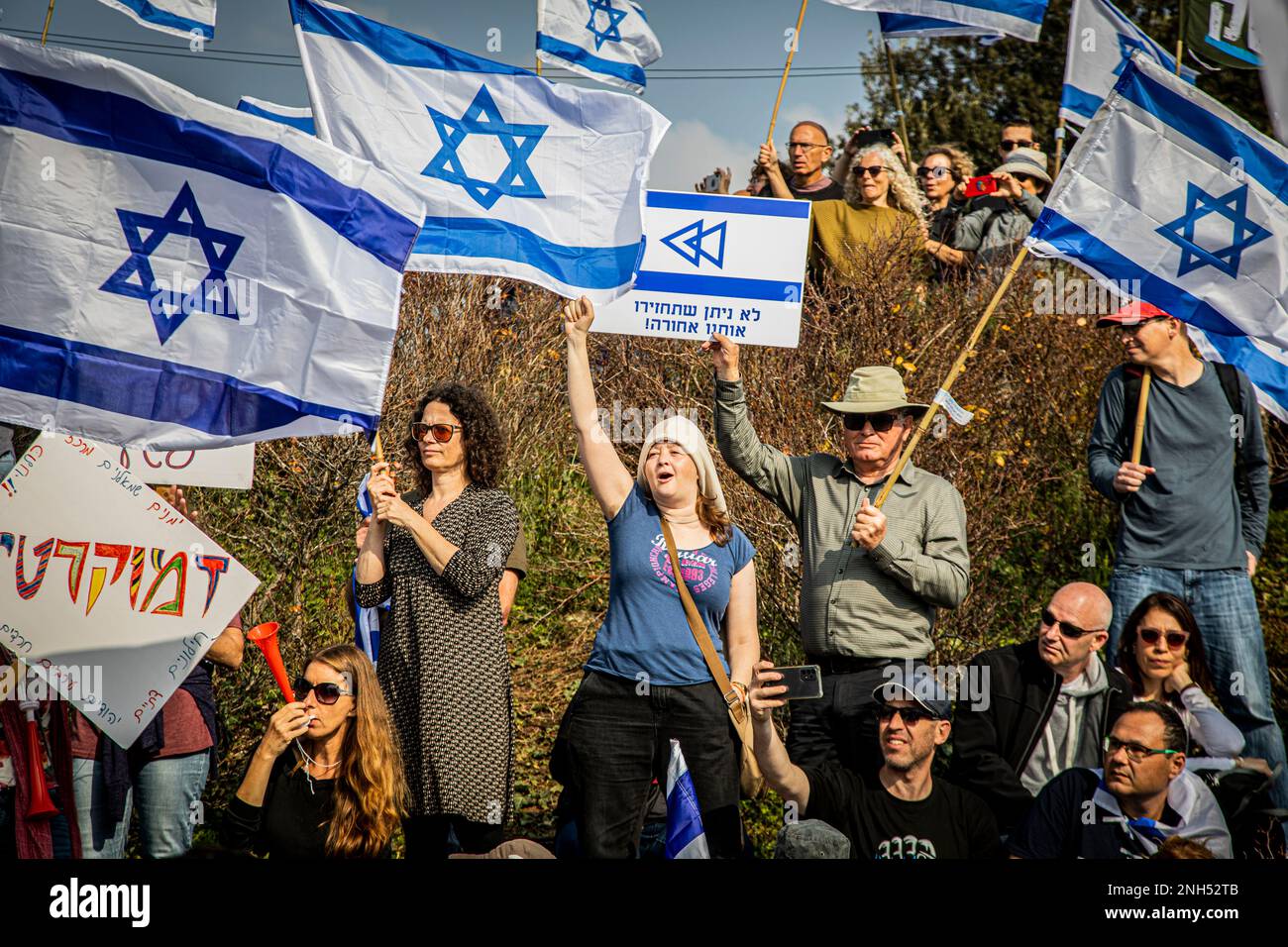 Jerusalem, Israel. 20th Feb, 2023. Protestors wave Israeli flags during ...