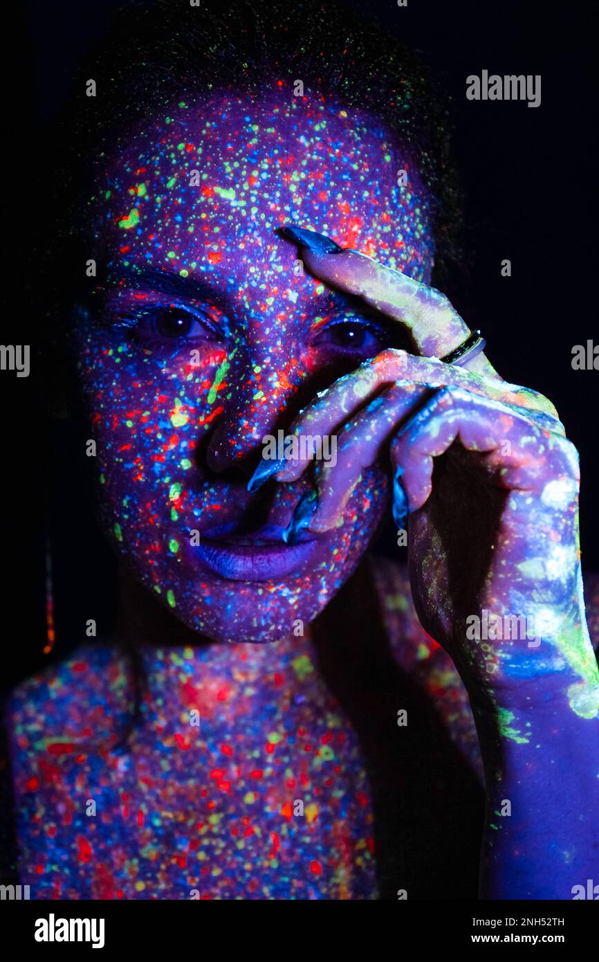 Fashion model woman in neon light, portrait of a beautiful model with ...