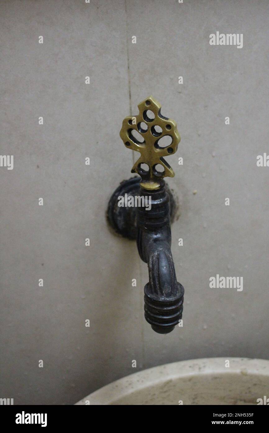 Ancient tap hi-res stock photography and images - Alamy