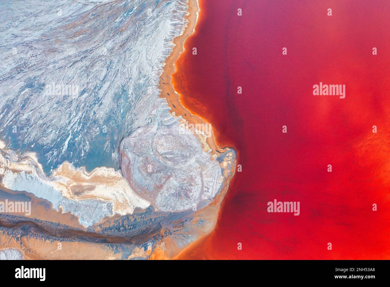 vast titanium mine with tailing ponds filled with technical fluids used ...