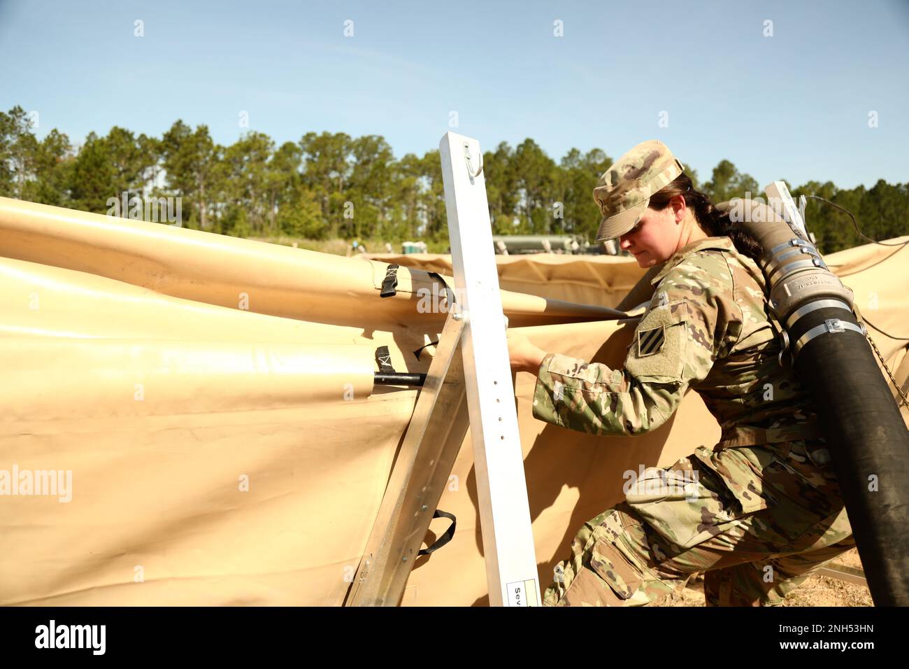 A Soldier with the 135th Quartermaster Company, Division Sustainment ...