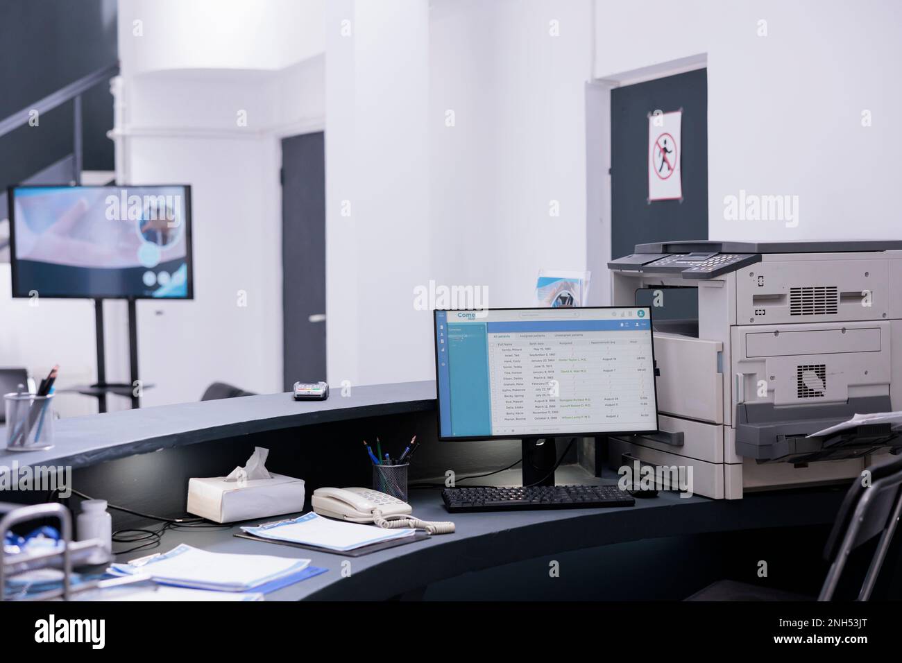 List of patients appoinments displayed on desktop computer screen on ...