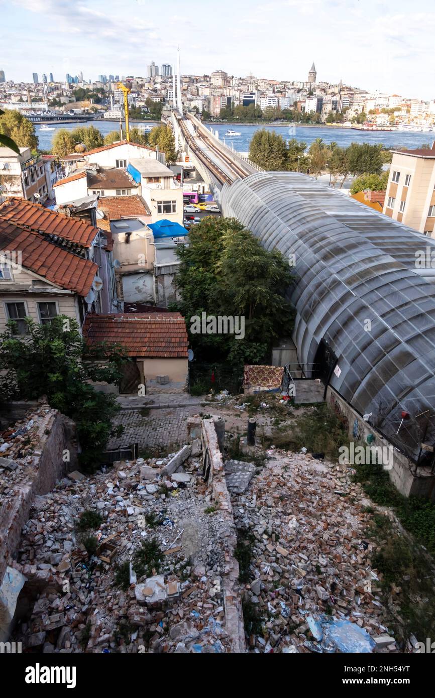 Demolished remains debris under Golden Horn Bridge with Istanbul ...