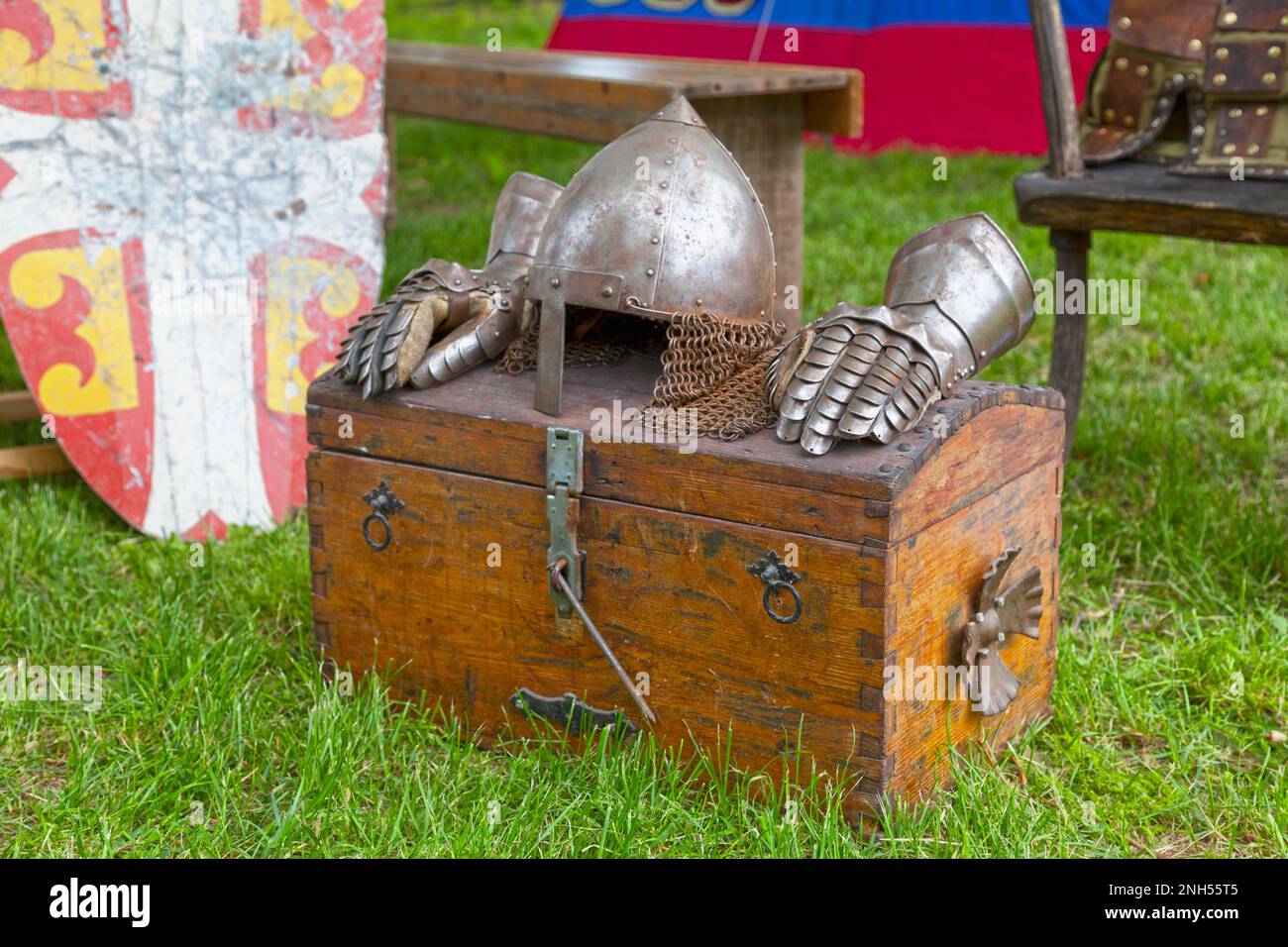 A Nasal helmet (chichak) and a pair of Gauntlets on the top of a wood ...