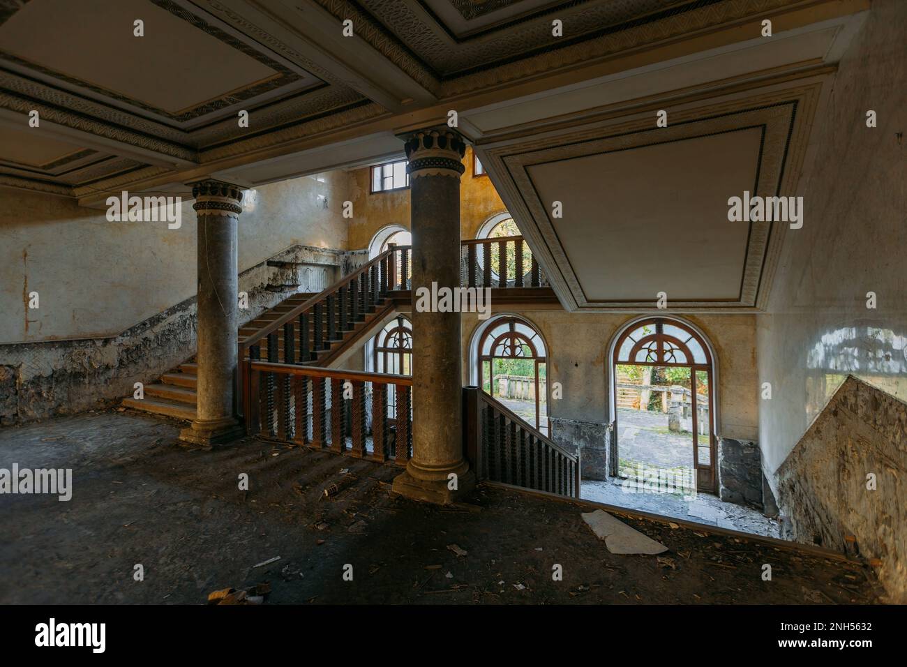 Inside of old creepy abandoned mansion. Staircase and colonnade Stock ...