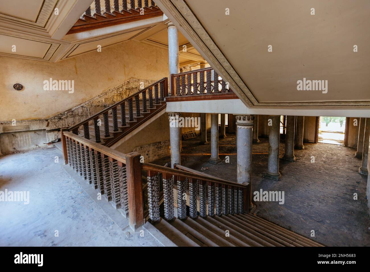 Inside of old creepy abandoned mansion. Staircase and colonnade Stock ...