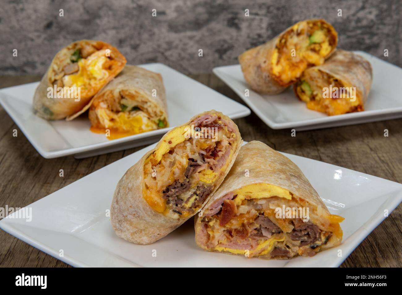 Difficult choice of which of these loaded breakfast burritos to eat ...
