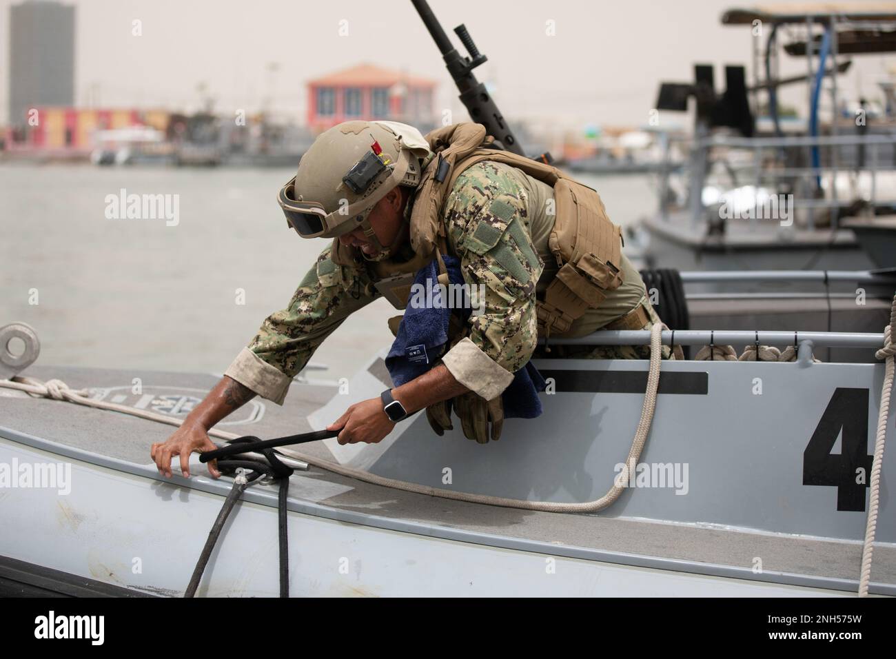 U.S. Navy Sailor assigned to Maritime Expeditionary Security Squadron 1 ...