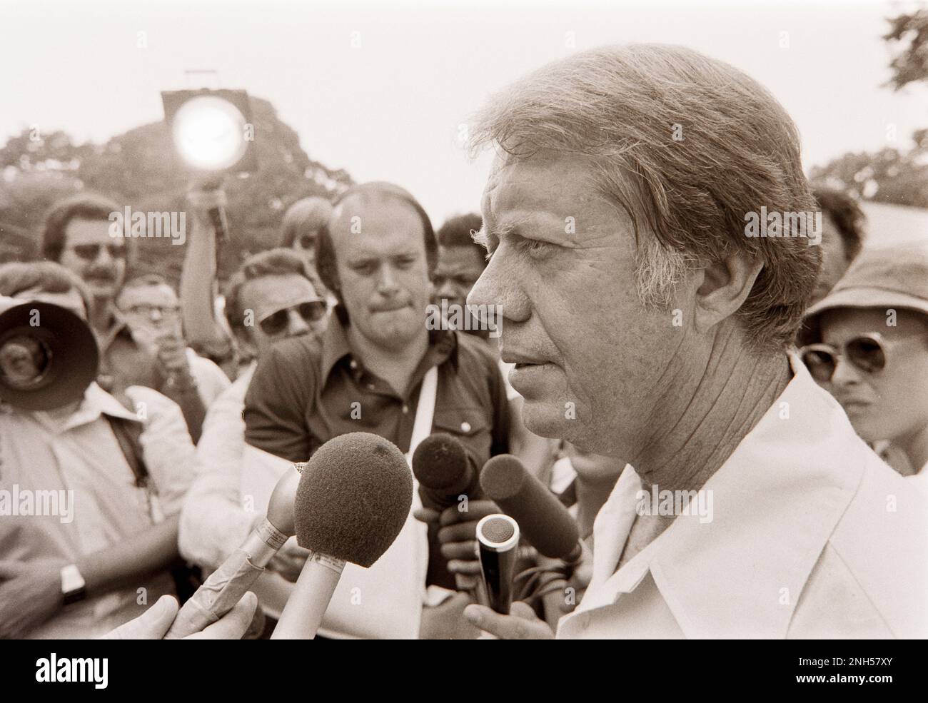 Candidate Jimmy Carter with the press in downtown Plains, Georgia Stock ...
