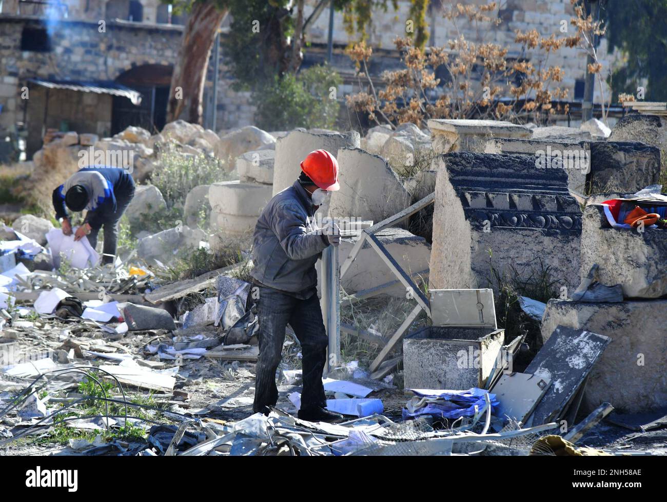 Damascus, Syria. 20th Feb, 2023. People remove debris from an area ...