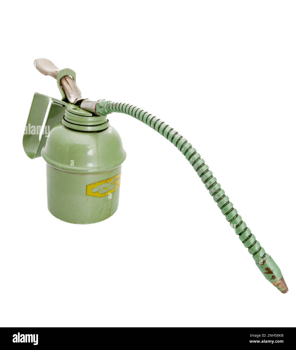 old green metal oiler with long, flexible spout and disused appearance ...
