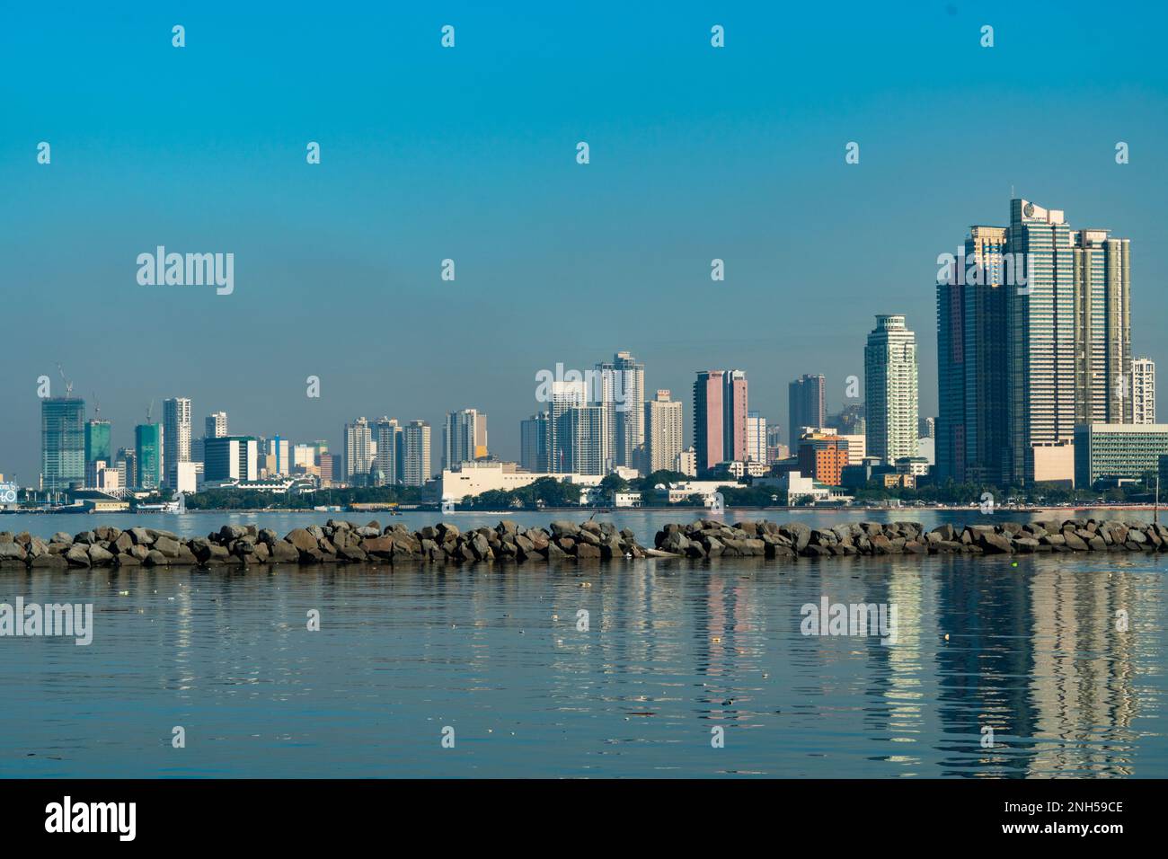 Skyline buildings are seen along Roxas Boulevard in Manila, Philippines ...