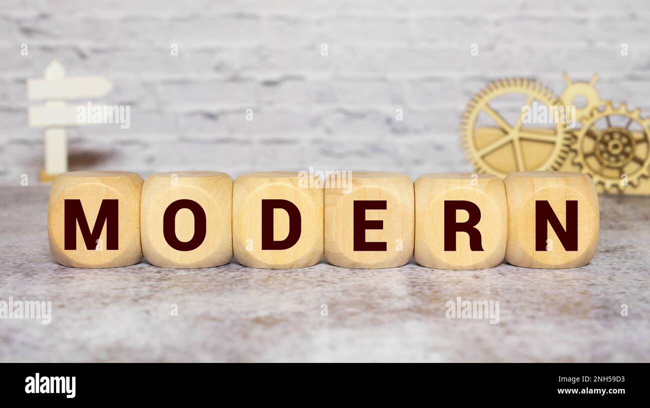 Modern model symbol. Businessman turns wooden cubes and changes the ...