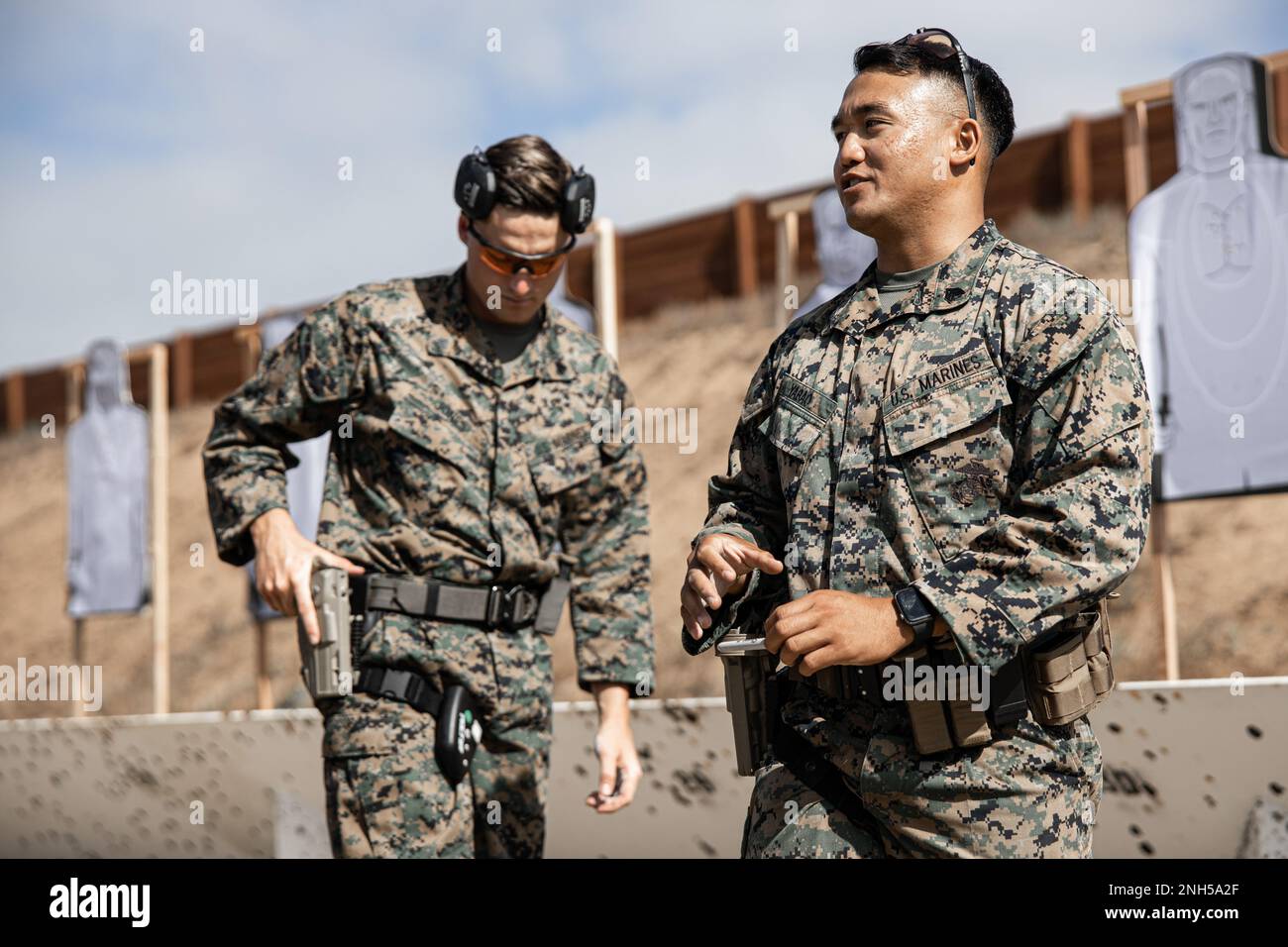 U.S. Marine Corps Sgt. Benjamin Jones, left, and Sgt. Zoren Yabao ...
