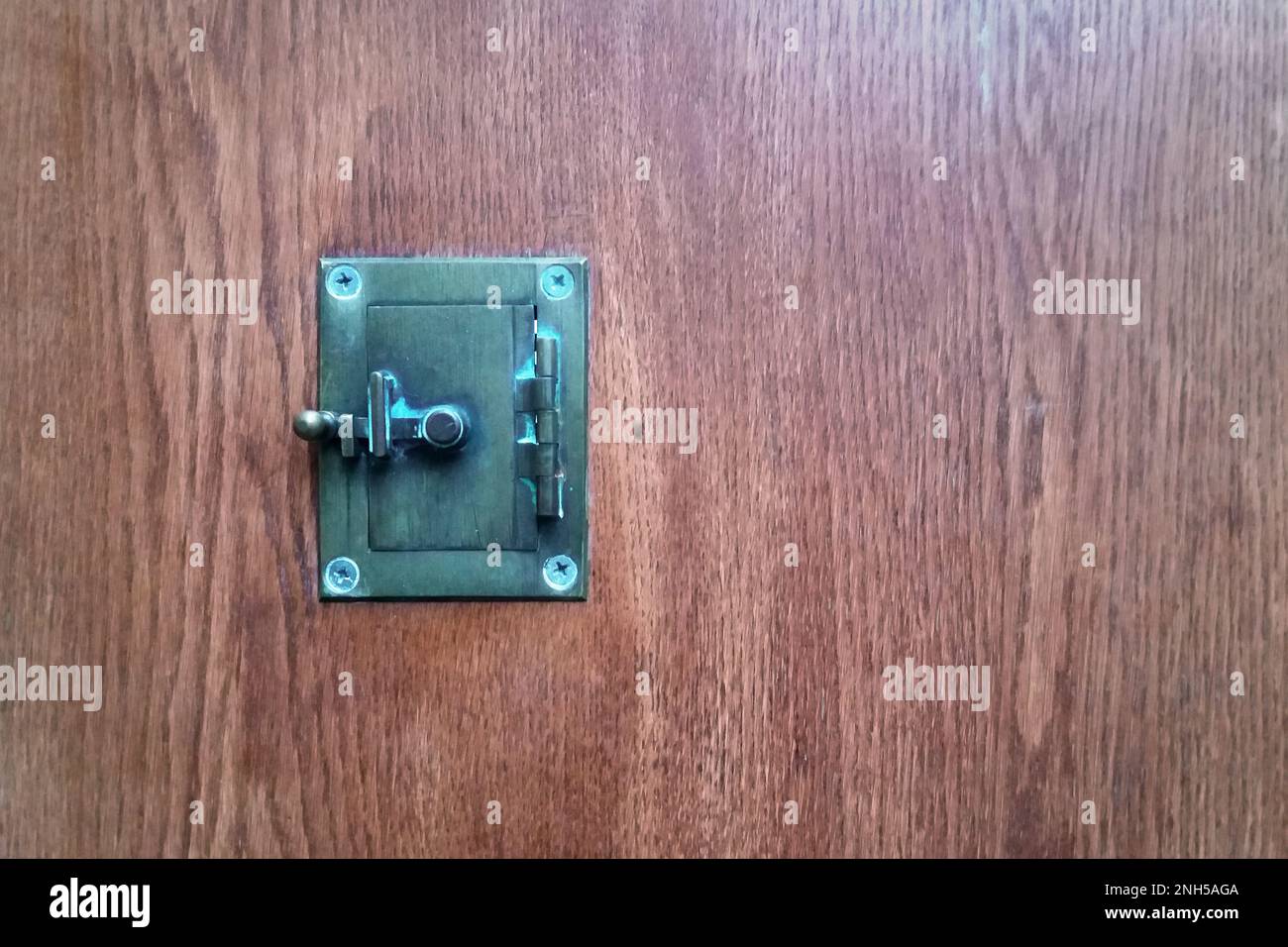 A peephole, peek hole, spyhole or door viewer, is a small opening ...