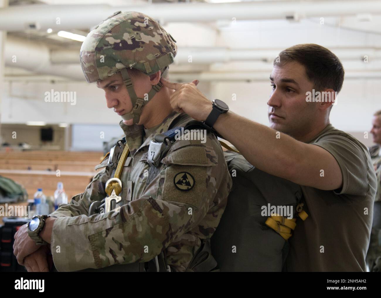 Staff Sgt. Raymond A. DeBusschere performs a jumpmaster personnel ...