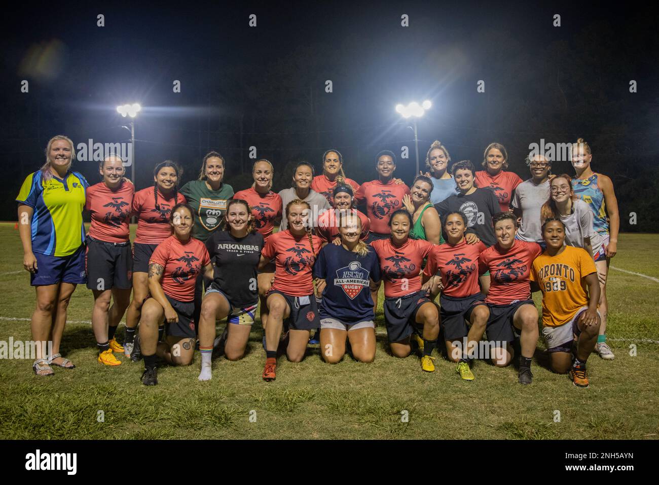 U.S. Marines with the USMC Rugby Team, gather to get their picture ...