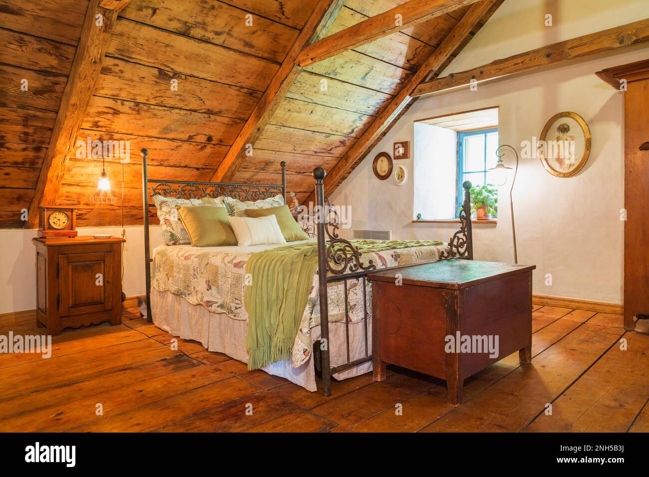 Queen size four poster bed with antique metal headboard and footboard ...