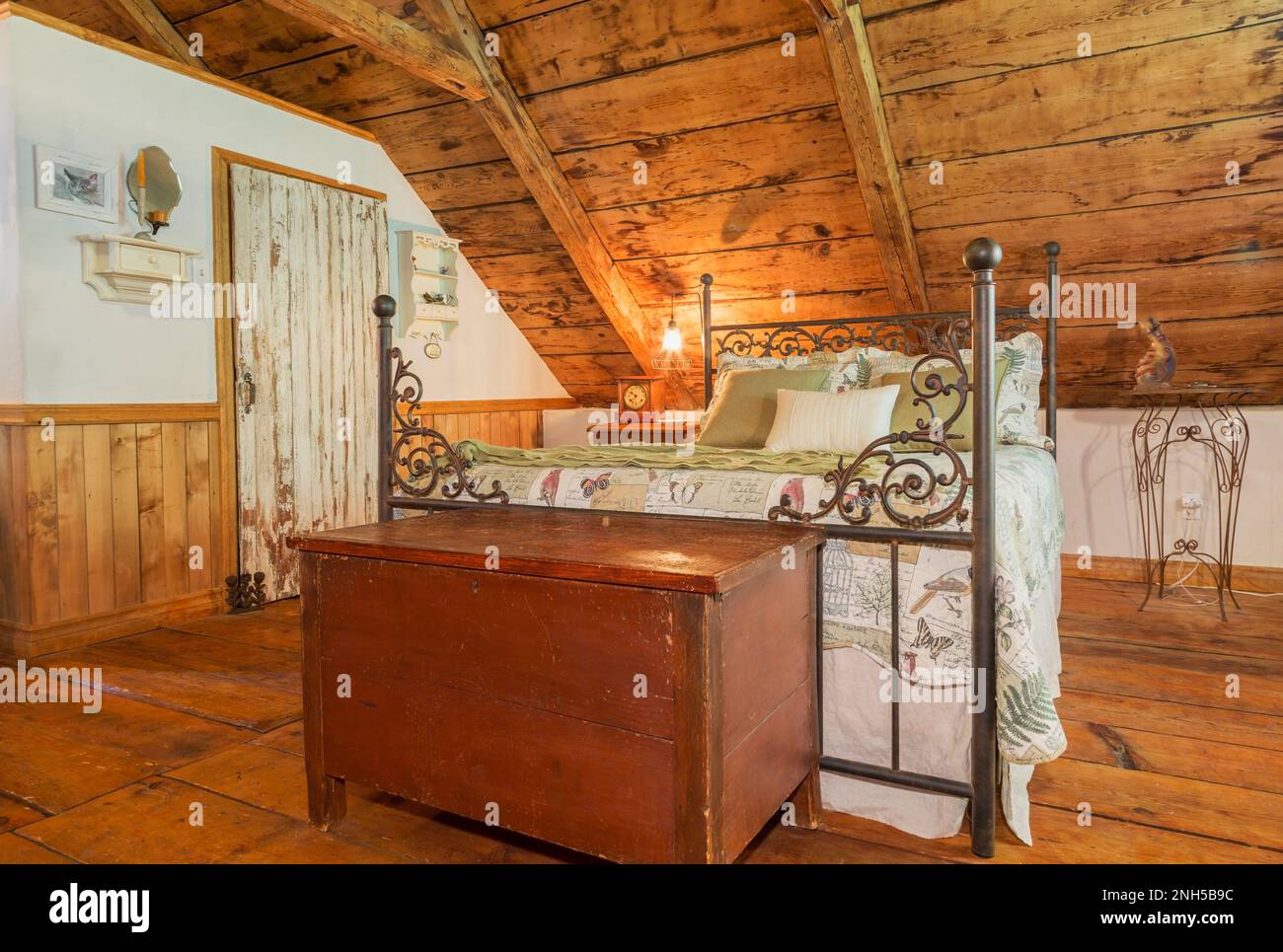 Queen size four poster bed with antique metal headboard and footboard ...
