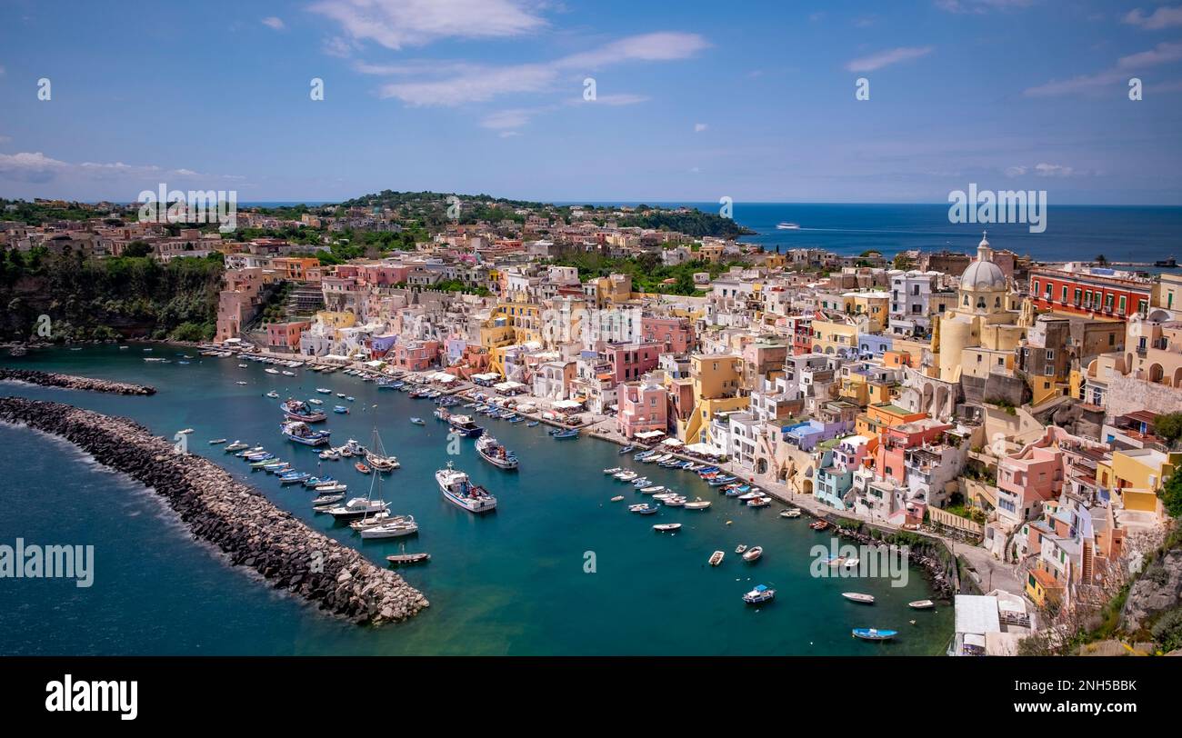 View of the Port of Corricella with lots of colorful houses on a sunny ...