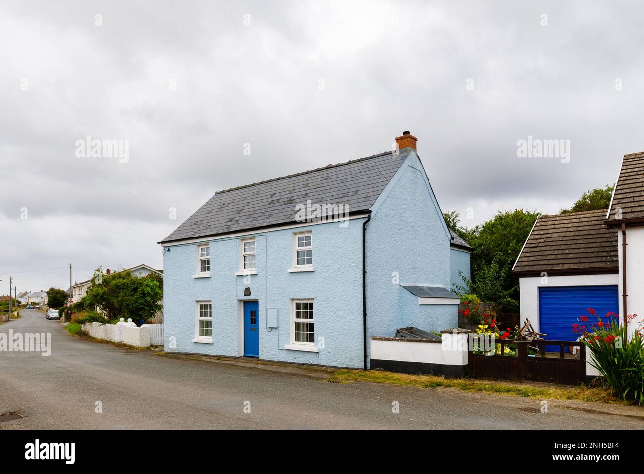 Blue roadside cottage in Marloes, a small village on the Marloes ...